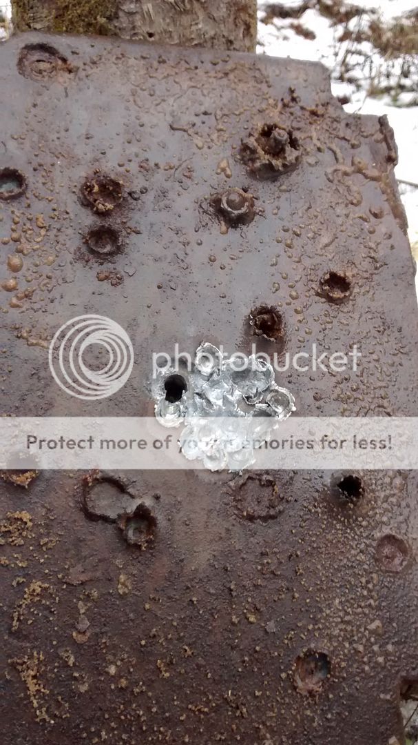 How much steel will a 50BMG API round penetrate?